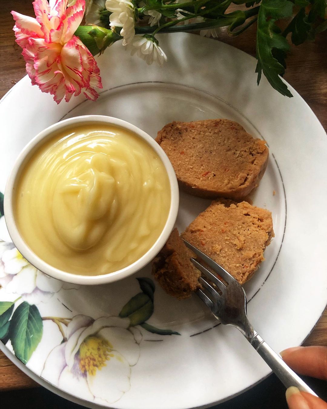 Moin moin served with a bowl of silky smooth yellow ogi (made from ...